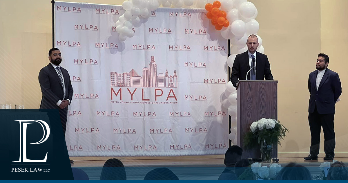 Ross Pesek is awarded the Latino Ally of the Year recognition by MYLPA